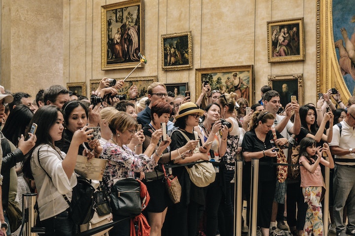 Group Of Tourists Taking Photos In An Art Gallery When Your Article Is 